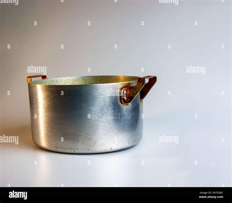 An Old Aluminum Pan Made In Circa 1960 Against A White Background Stock