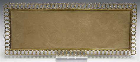 A Late 19th Century Brass Rectangular Frame Of Chainlink Form The Back