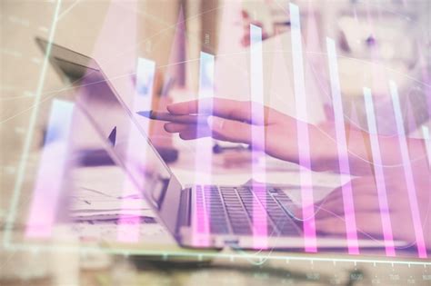 Premium Photo Multi Exposure Of Woman Hands Typing On Computer And Financial Graph Hologram