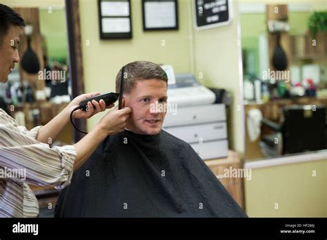 Retired Us Marine Corps Cpl William Kyle Carpenter Sits For A Haircut In Bethesda Md June
