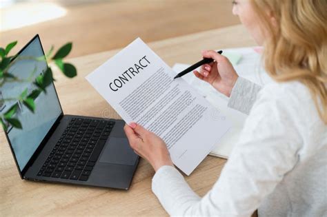 New Employee Reading And Filling Employment Contract And Making