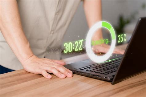 Adult Man Using A Laptop Computer For Download Software And Waiting To Loading Digital Business