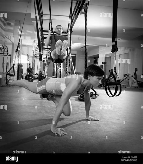 Fitness TRX Training Exercises At Gym Woman And Man Stock Photo Alamy