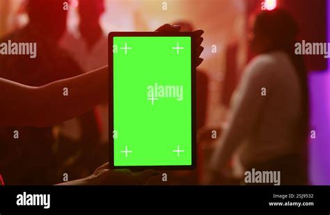 Girl Showing Greenscreen Display At Club Stock Video Footage Alamy