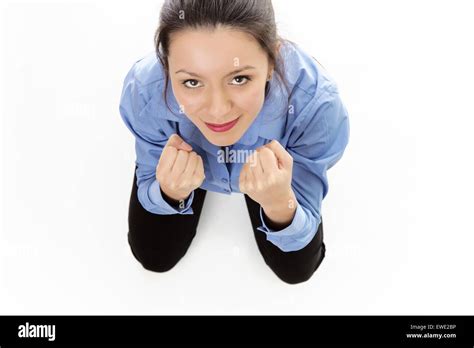 Happy Business Woman On Her Knees With Her Arms In The Air Shot From A
