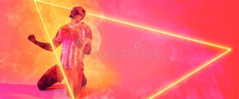 African American Male Player Kneeling And Screaming By Illuminated