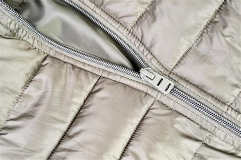 Premium Photo Closeup Slider Of Metal Zipper Fastener With Metal