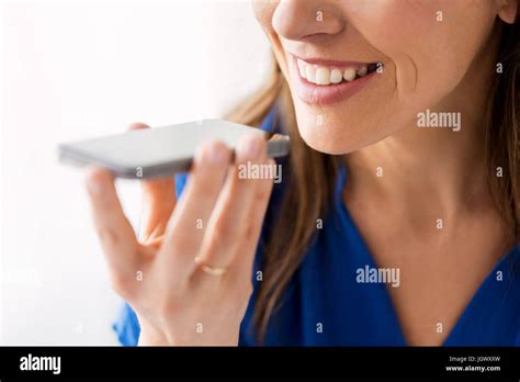 Woman Using Voice Recorder On Smartphone Stock Photo Alamy