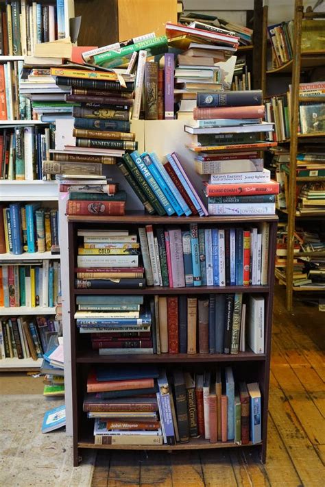 Books In And On Bookcase At A Second Hand Book Store Editorial Stock Image Image Of Pile