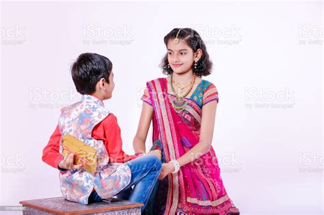 Cute Indian Brother And Sister Celebrating Raksha Bandhan Festival