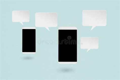 mobile phone and white blank speech bubble on grunge blue background