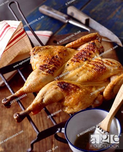 Butterflied And Grilled Chicken Basting Sauce And Brush In A Bowl