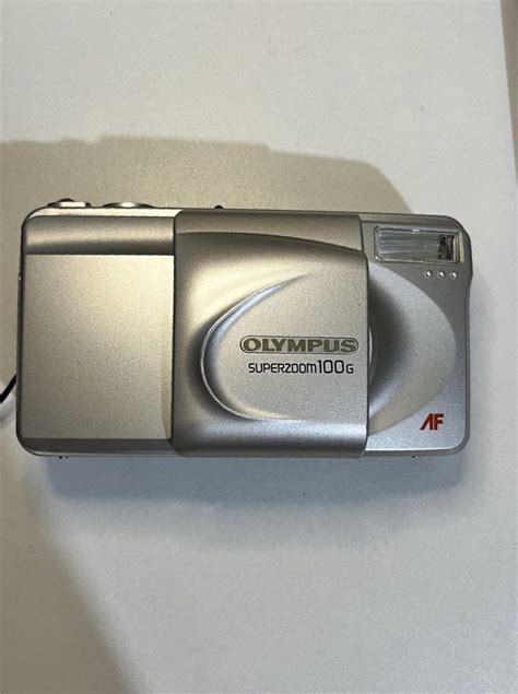 Olympus Superzoom 100g film camera, Photography, Cameras on Carousell