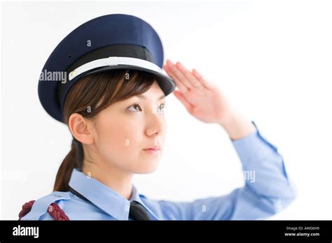 Young Security Guard Saluting Banque De Photographies Et Dimages à