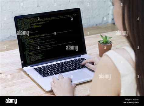 developer team working laptop computer mobile application softwareand