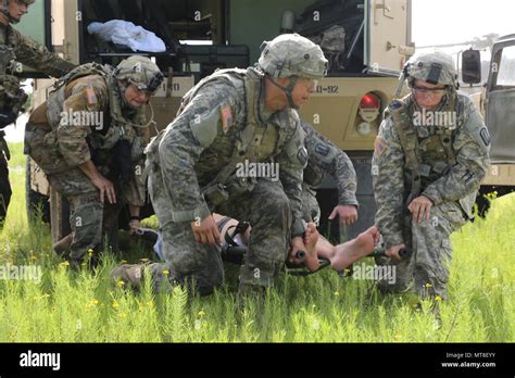 Fort Polks Medical Evacuation Team Lifts A Soldier Suffering From Heat