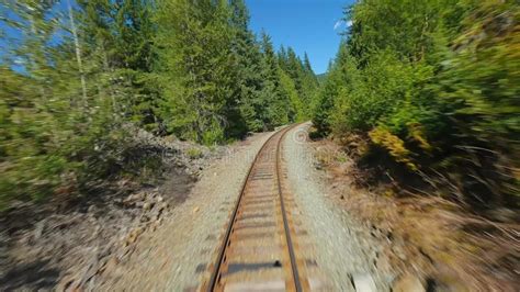 Fpv Drone Is Flying Fast Forward Over Railway Track Canada Stock