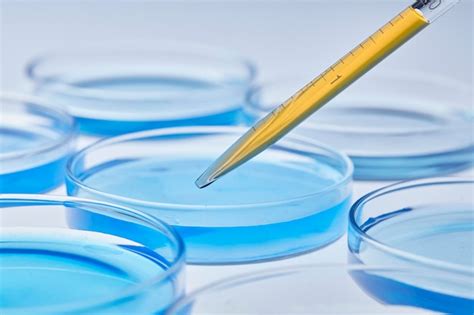 Premium Photo Science Laboratory With Beaker And Dropper