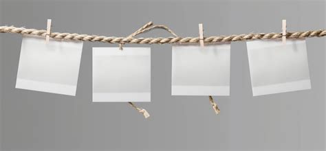 Set Of White Blank Photo Cards And Paper Notes With Wooden Clothespins