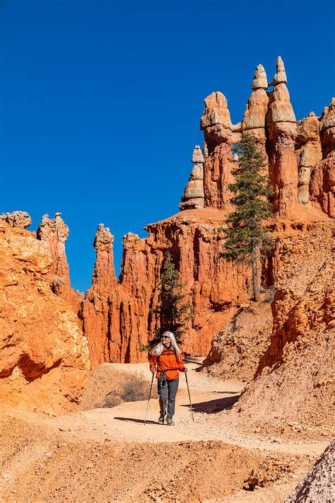 Senior Woman Hiking In Bryce Canyon License Image 14276625 Lookphotos