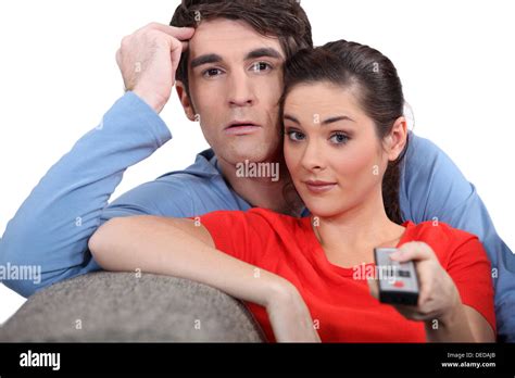 Couple With A Remote Control Stock Photo Alamy