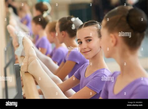 Beautiful Smiling Ballerina Stretching Leg Young Lovely Ballerina
