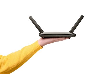 Premium Photo Black Wifi Router On Female Hand Isolated On White
