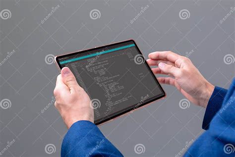 Hands Of Caucasian Male Programmer Using Tablet With Coding On Screen