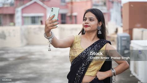Beautiful Indian Girl Taking Selfie On Her Mobile Phone Outdoor