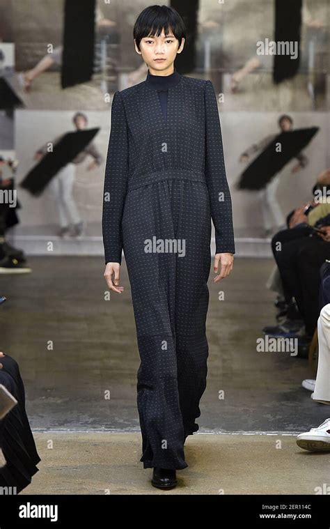 Model Shiyi Lin Walks On The Runway During The Apc Fashion Show During Paris Fashion Week