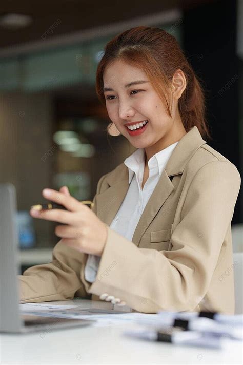 Asian Businesswoman Video Calling Customer For Finance And Real Estate