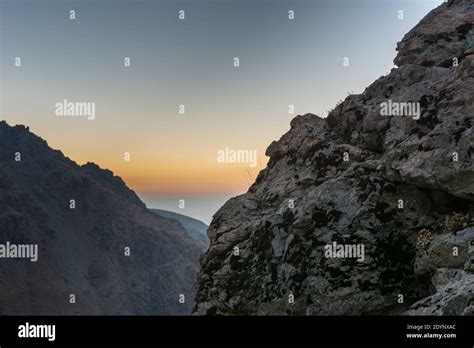 Barren Mountain In Darband Valley In Dawn Against Colorful Sky In The
