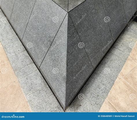 Geometric Concrete Wall Design With Triangular Patterns Textured