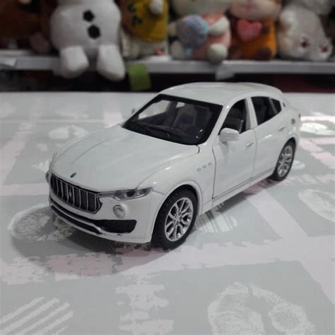 خرید و قیمت اسباب بازی ماشین فلزی مازراتی عقبکش موزیکال 6 در بازشو ترب