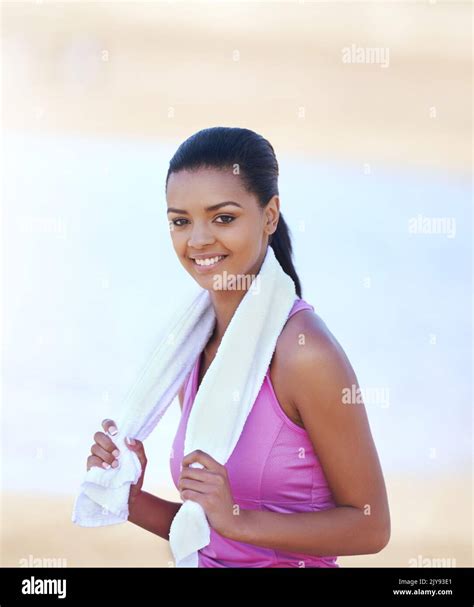 Happiness Is An Inside Job Portrait Of A Young Woman Holding A Towel