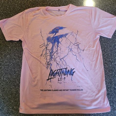Lightning T Shirt With A Vintage Look To It Depop