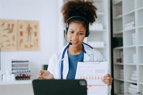 Premium Photo Attractive African Female Doctor Talking While