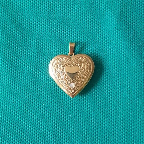 خرید و قیمت لاکت قلبی دو طرفه طرح دار استیل طلایی و نقره ای مناسب رزین