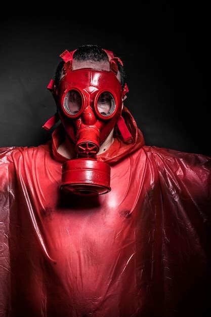 Premium Photo Inhalation Nuclear Concept Man With Red Gas Mask