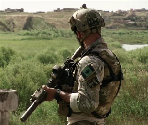 A Csor 🇨🇦 Operator Stands On Top Of A Bridge At The Khazir River Near