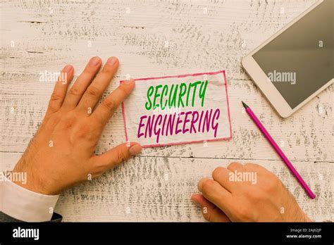 Conceptual Hand Writing Showing Security Engineering Concept Meaning Focus On The Security