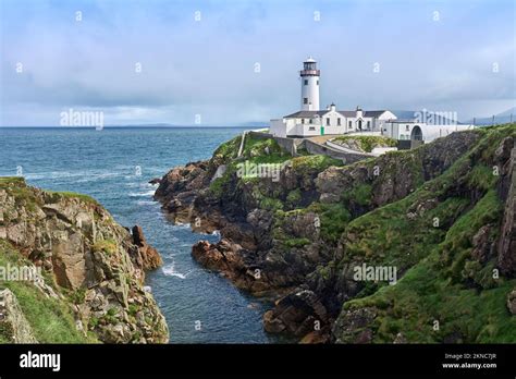 Fanad Head Lighthouse With Its Rough Cliffs In The Northern Part Of