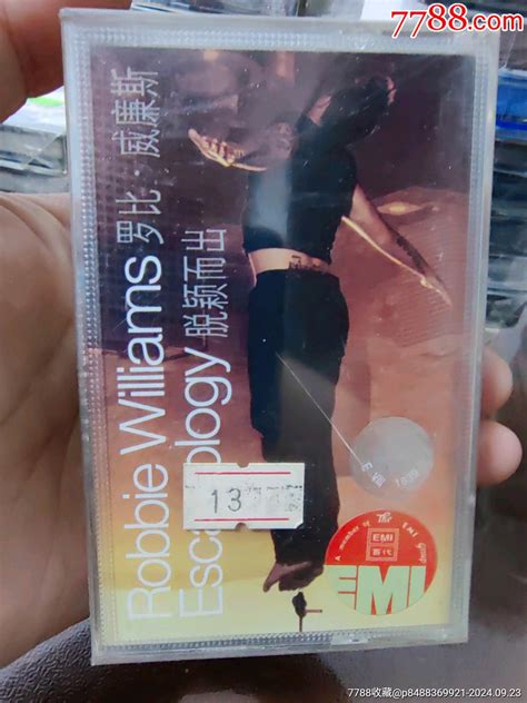 罗比威廉斯《脱颖而出》~原膜未拆磁带卡带南宫杂货铺【7788核雕收藏】