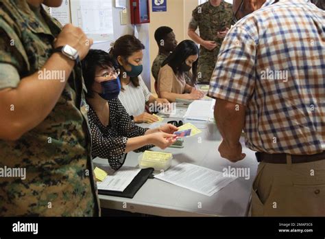 Staff From The Privately Owned Vehicle Section Of The Mcipac Safety Office Check Applicants Staff From The Privately Owned Vehicle Section Of The Mcipac Safety Office Check Applicants