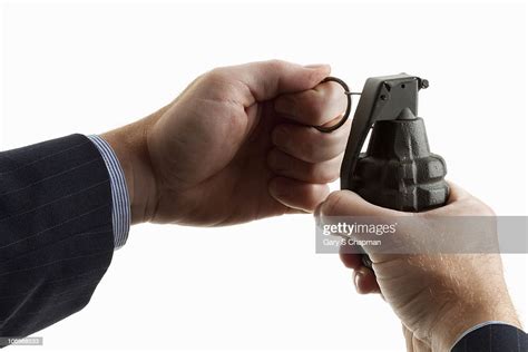 Pulling A Grenade Pin With Teeth At Pamela Alvarez Blog