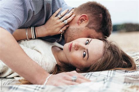 Young Sensual Couple Outdoor Beach Portrait By Stocksy Contributor