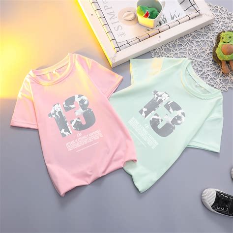 เสื้อผ้าเด็กแฟนชั่น เสื้อยืดแขนสั้นเด็กหญิง เสื้อยืดแขนสั้นเด็กผู้ชาย ลายการ์ตูนน่ารัก ผ้านุ่ม