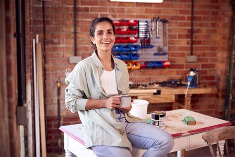 Woman Running Business In Workshop At Home Restoring And Upcycling