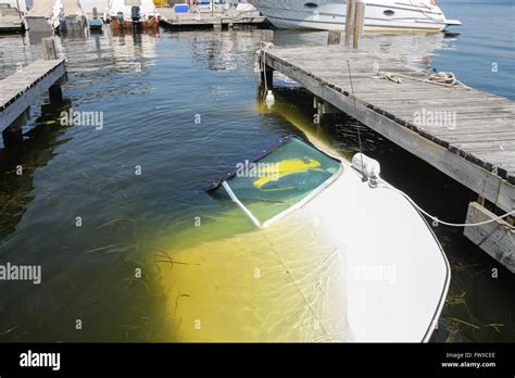 A Boat Sunk At The Dock Where It Was Moored The Owner Forgot To Stock