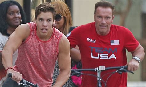 Arnold Schwarzenegger And Son Joseph Baena Take A Bike Ride After Gym